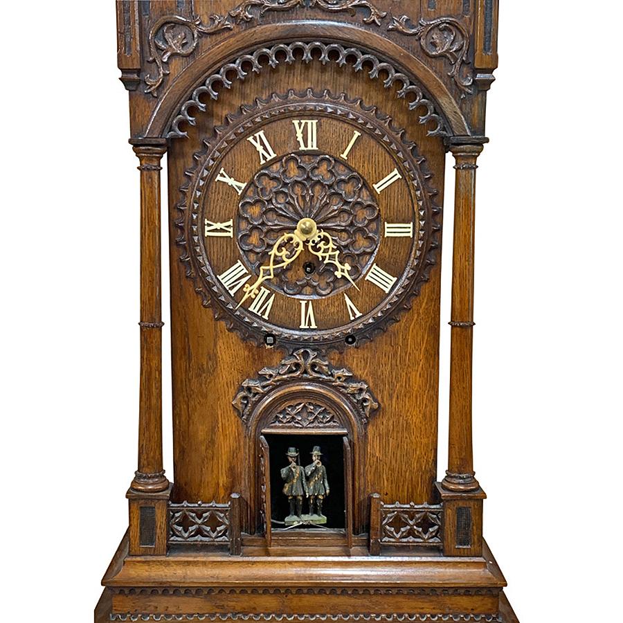 German Rare Carved Oak Trumpeter Clock - Renaissance Antiques