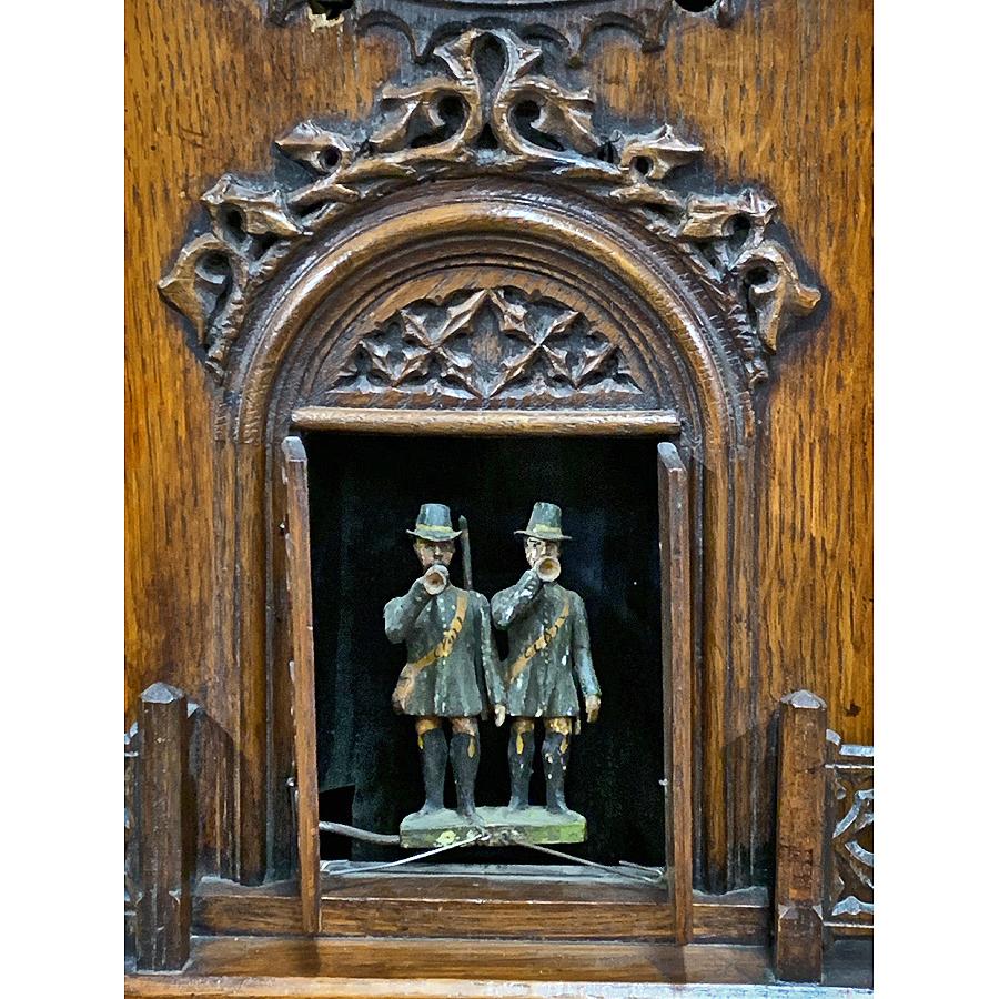 German Rare Carved Oak Trumpeter Clock - Renaissance Antiques